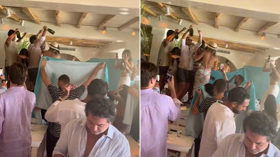 Μύκονος: Δείτε πως οι σερβιτόροι του Nammos προστατεύουν τους πελάτες από τα μπουγέλα με τις ...